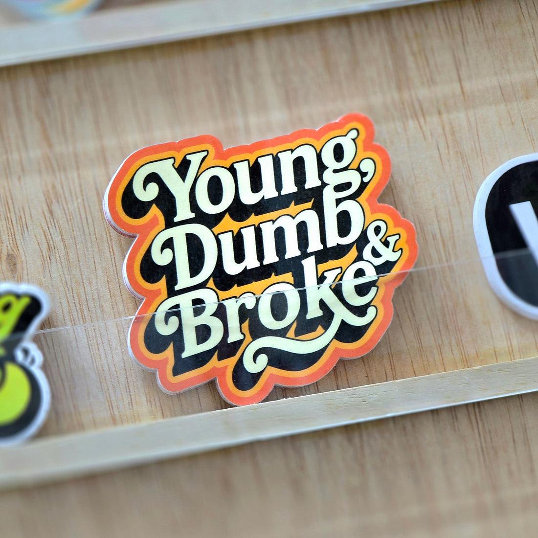 Young, Dumb & Broke – Sticker District